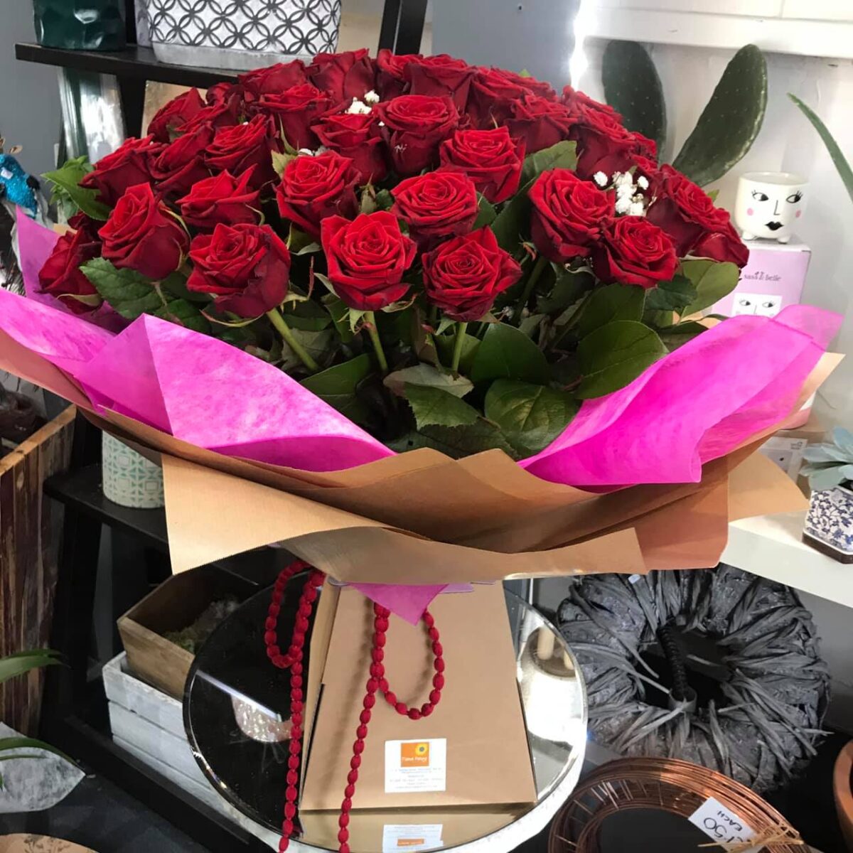 Luxury 50 Red Roses aqua packed bouquet, guaranteed to impress ...